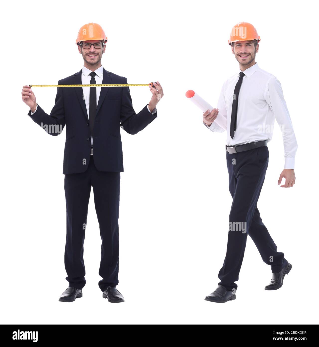 full-length .architect in orange helmet with drawings for new project ...