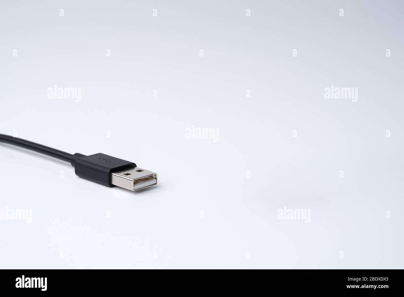 Close-up of black USB Type-A Male cable plug isolated on white ...