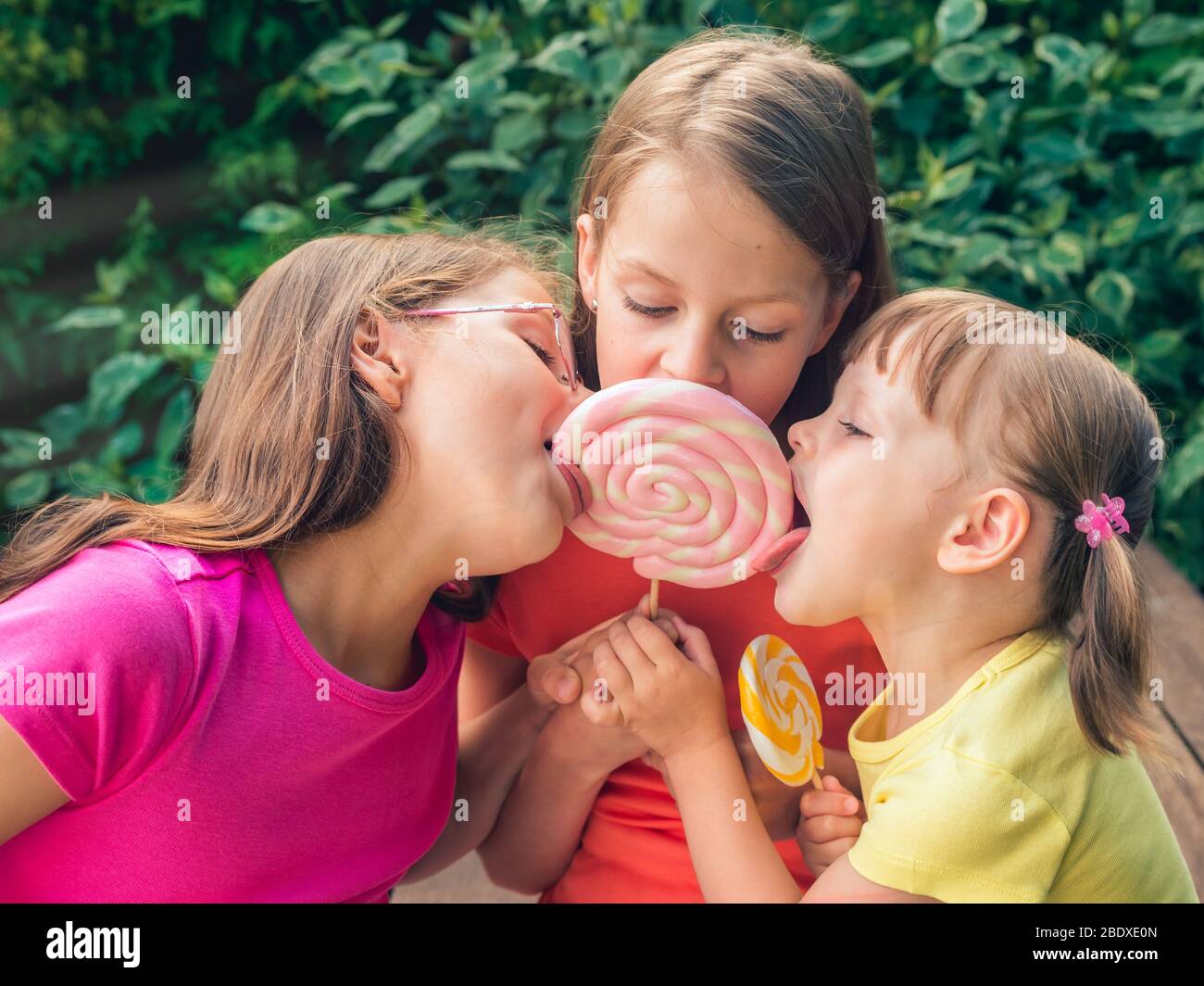 Little Girl Licking Lollipop