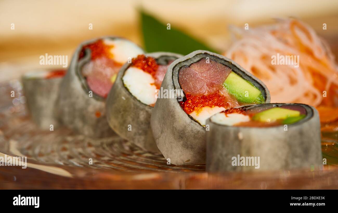 Spring rolls with tuna and salmon. Shallow dof Stock Photo - Alamy