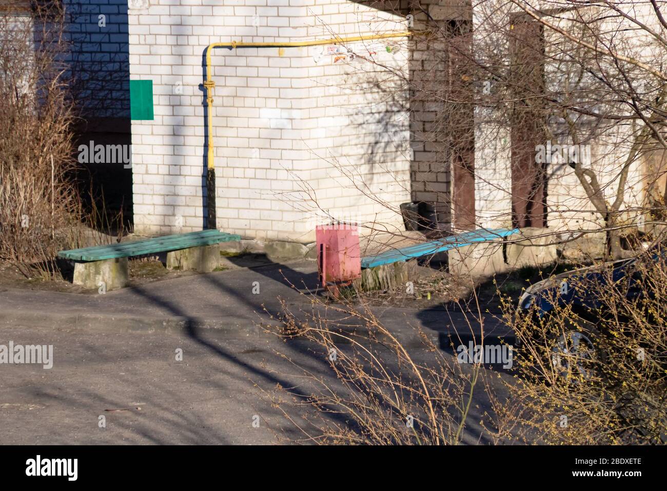 Exit the entrance of old residential building Stock Photo - Alamy