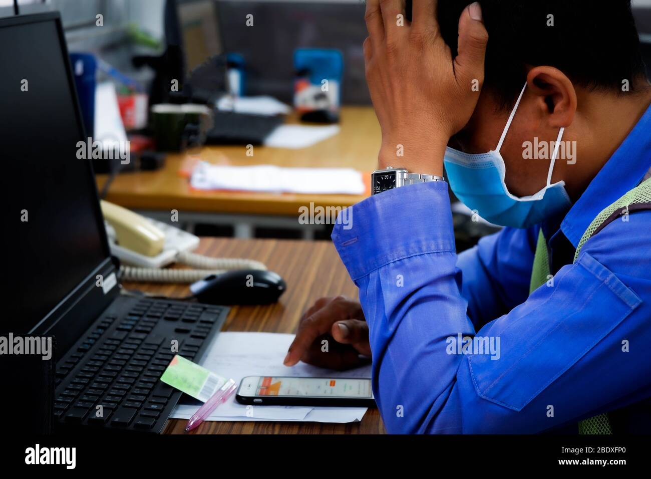 Use the phone at work stress perspective Stock Photo - Alamy