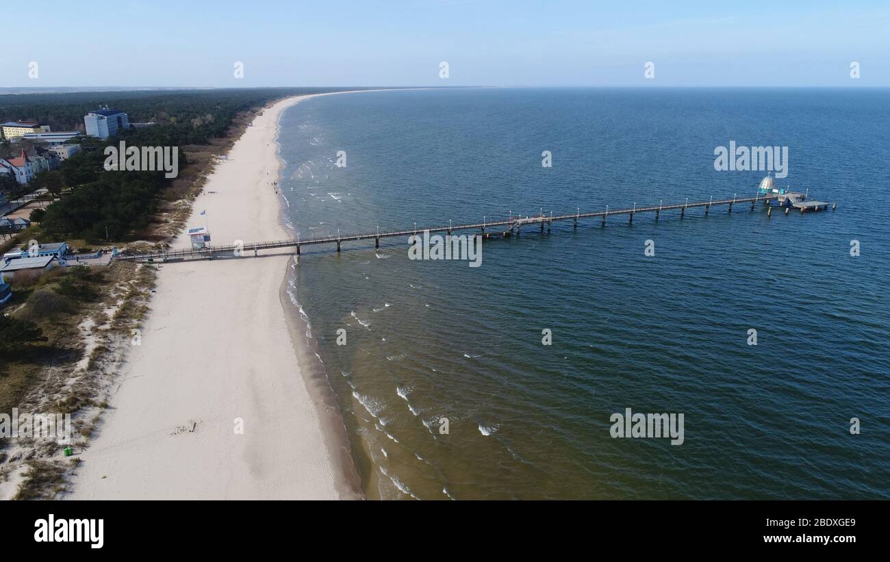 Zinnowitz, Germany. 10th Apr, 2020. The beach promenade with the pier ...