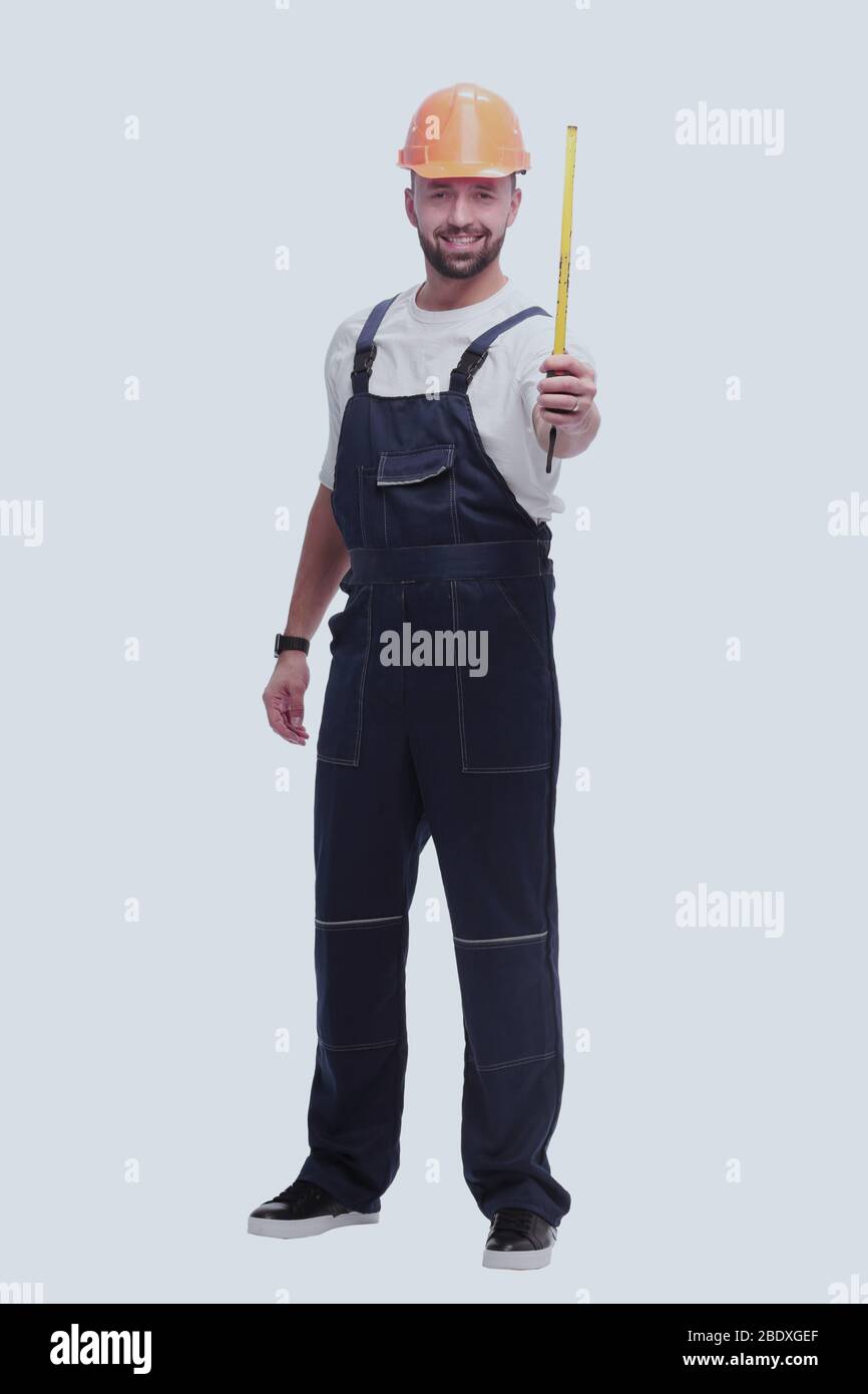 Builder measuring height tape measure hi-res stock photography and ...