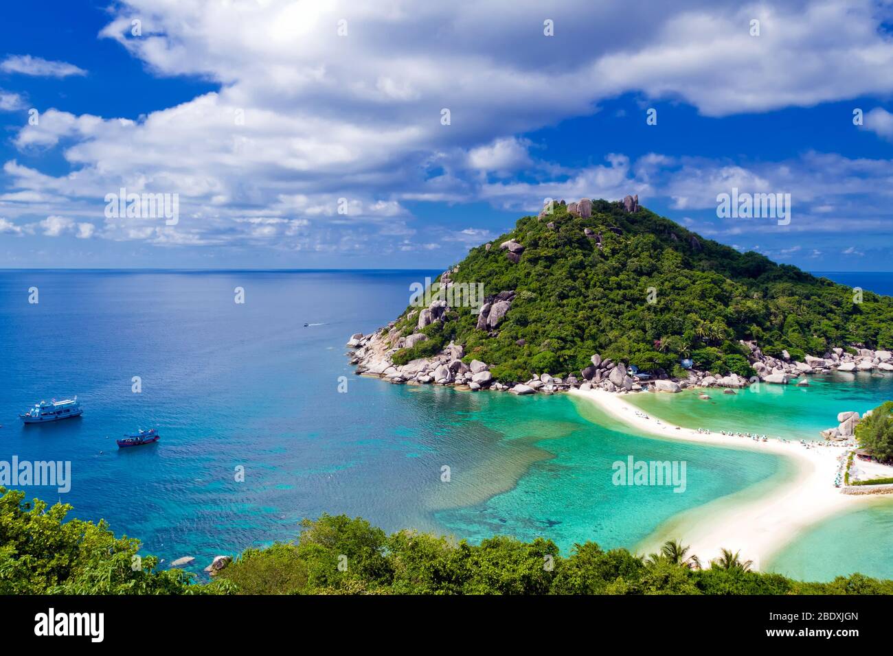Beautiful tropical island against blue sky with clouds. Koh Phan Stock ...