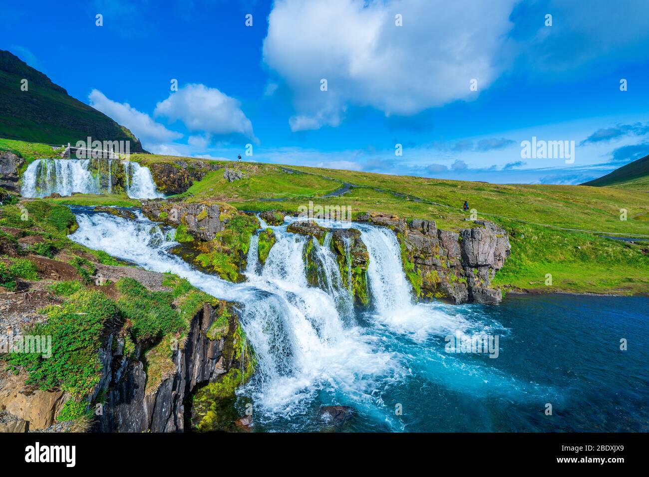 Kirkjufellsfoss, waterfall near the mountain of Kirkjufell ...