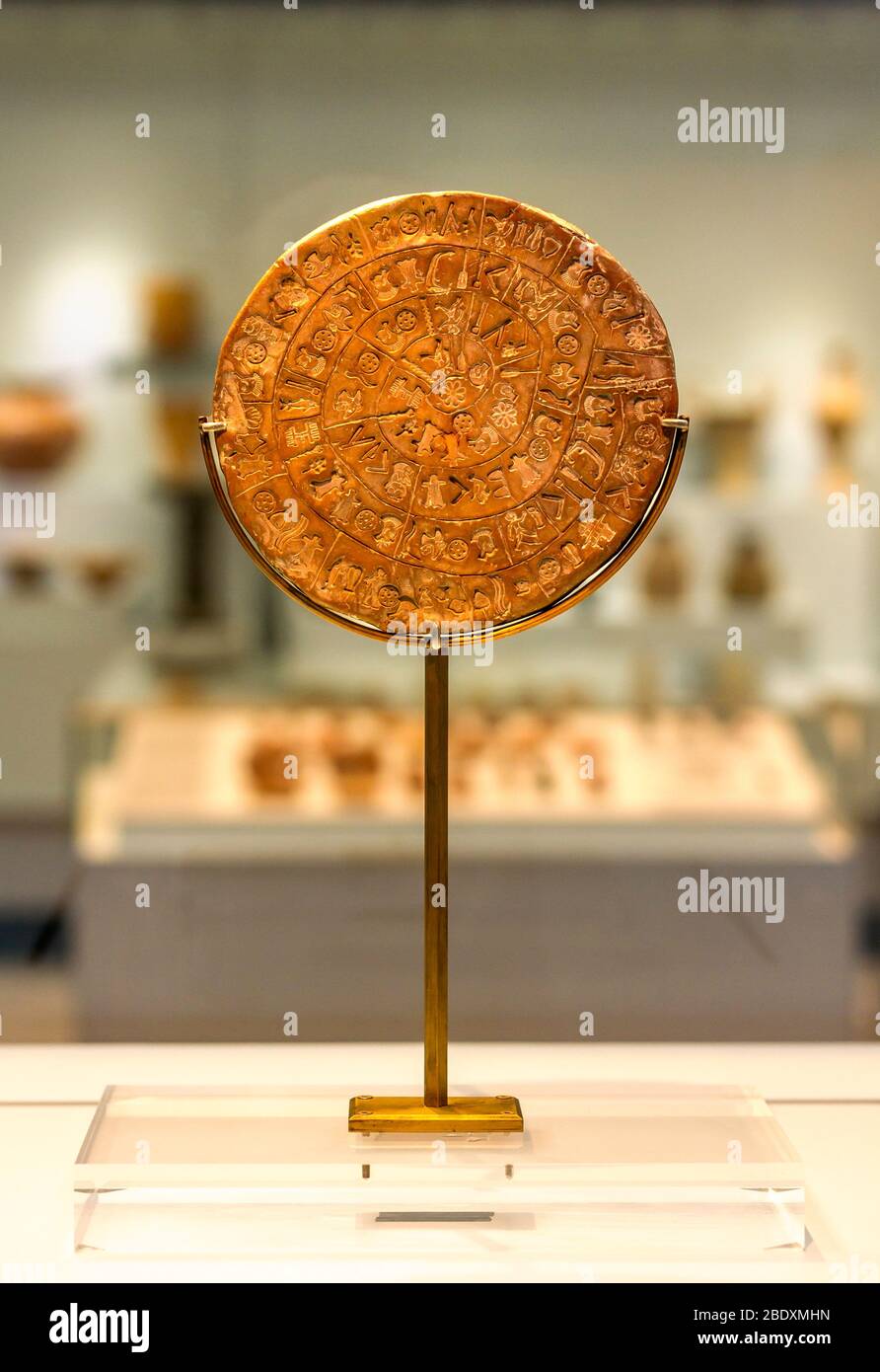 The famous Phaistos disc in the Archaeological Museum of Heraklion ...