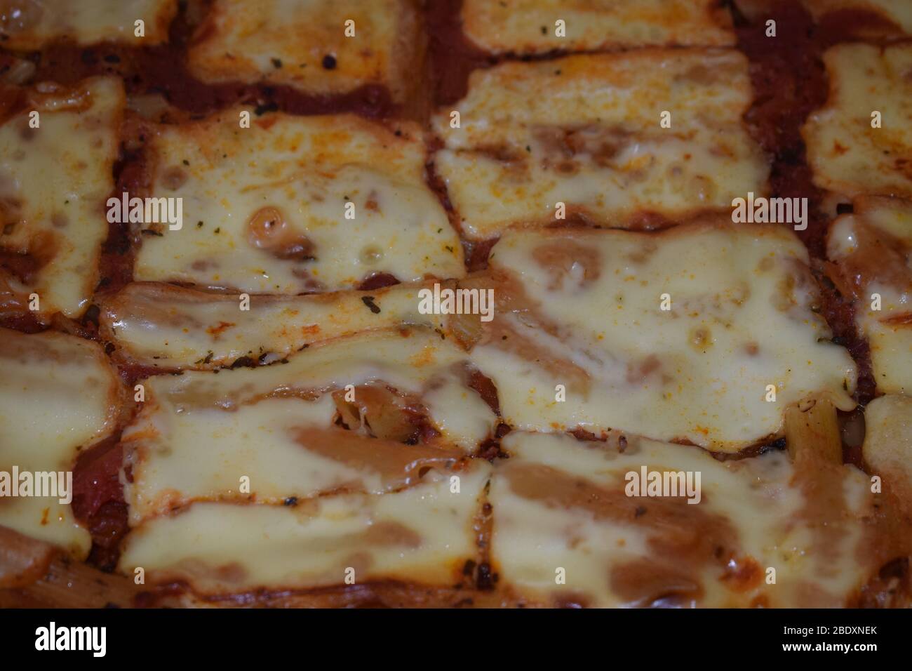 baked cheese topping Stock Photo - Alamy