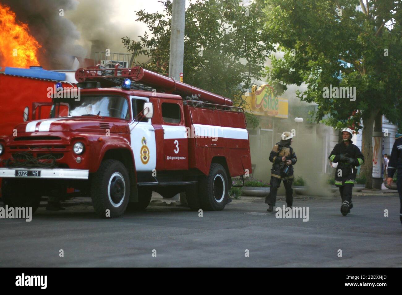 The fire brigade came to the fire call. Firefighters Work Concept Stock ...