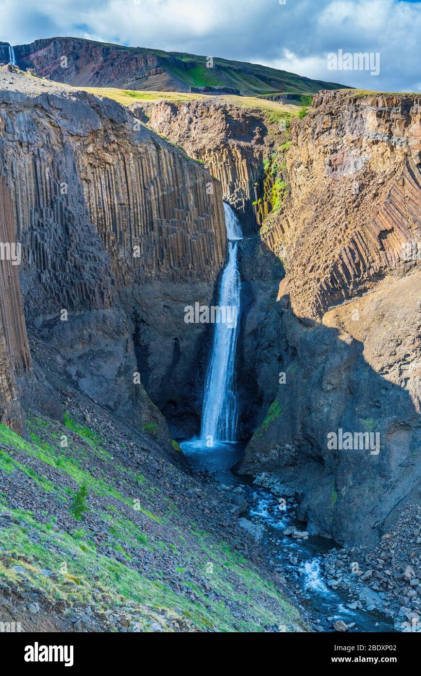 Litlanesfoss waterfall with basalt columns hi-res stock photography and ...