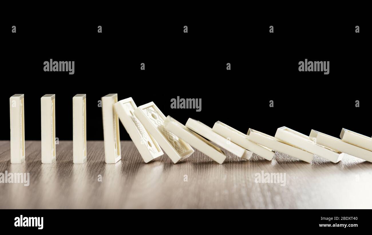 Domino effect falling row symbol hi-res stock photography and images ...