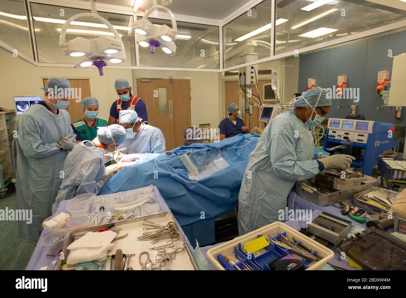 NHS surgeons and nurses perform surgery in an NHS Hospital.The ...