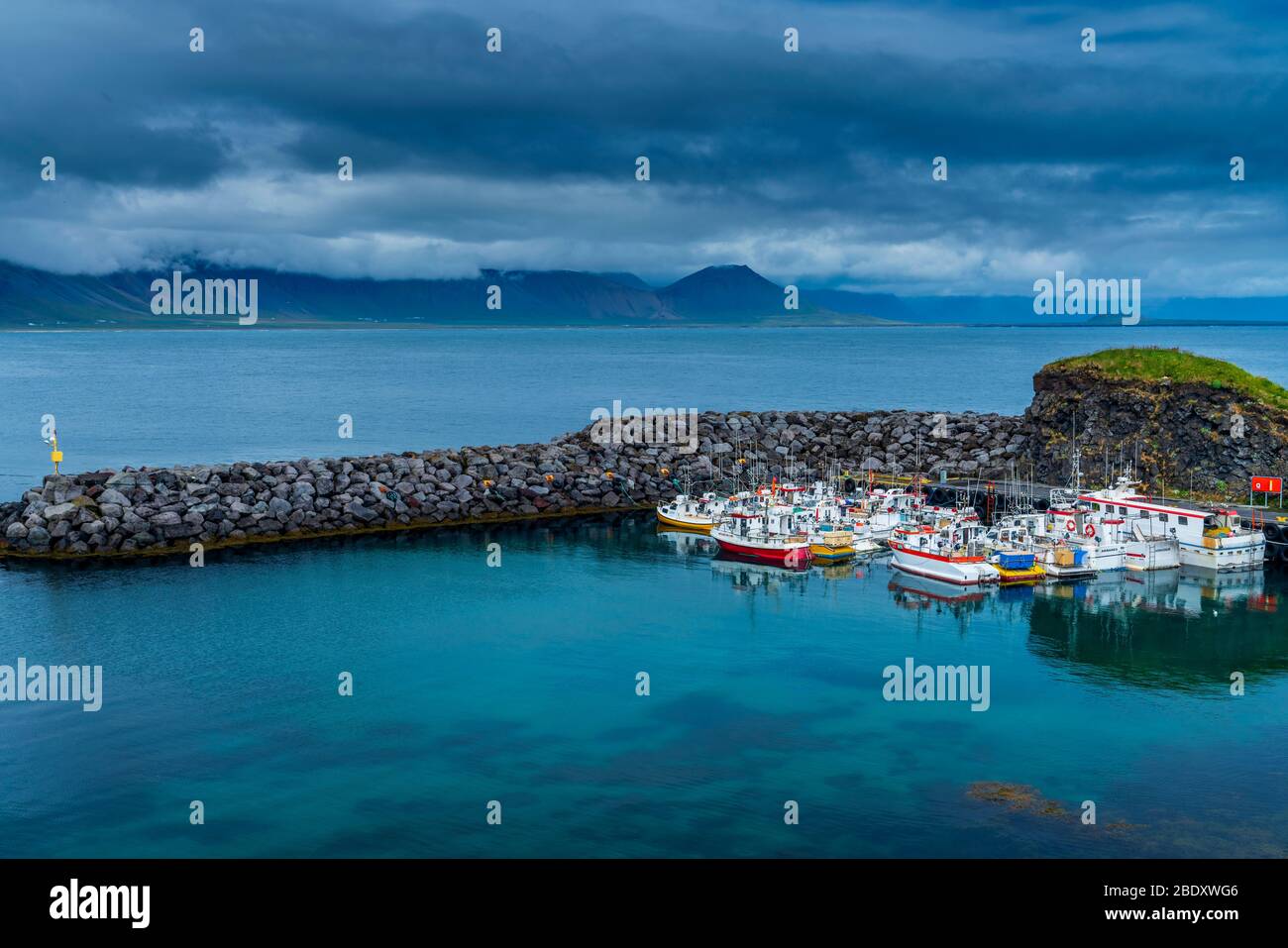 Coastal landscape in the port of arnarstapi hi-res stock photography ...
