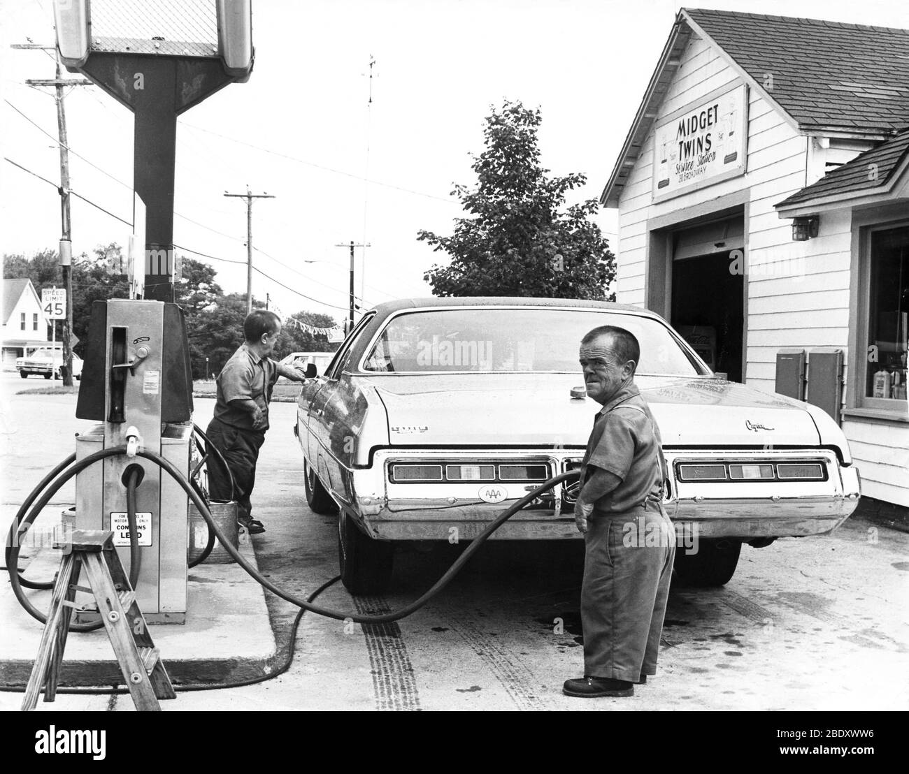 Dwarfs at service station Stock Photo - Alamy