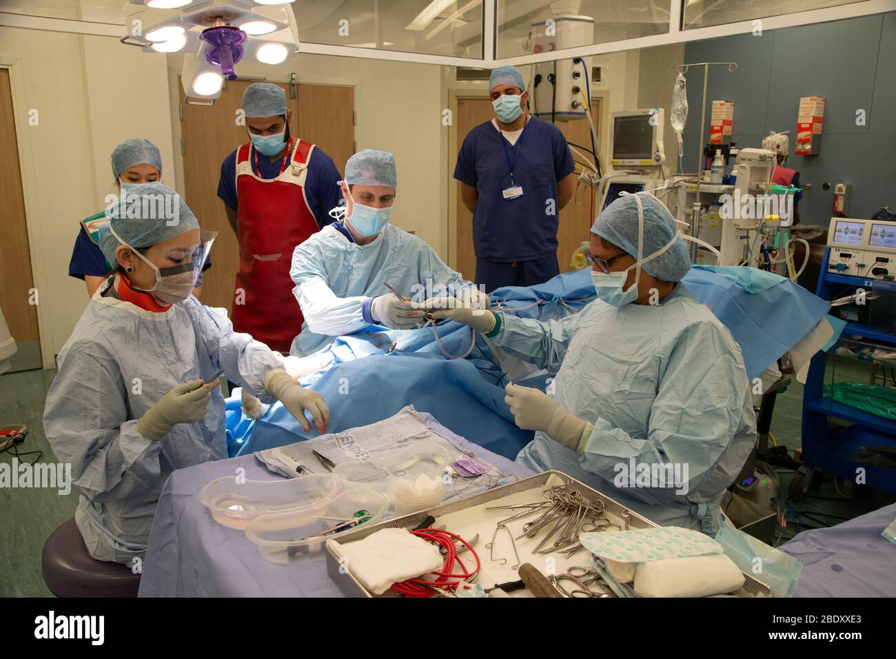 NHS surgeons and nurses perform surgery in an NHS Hospital.The ...