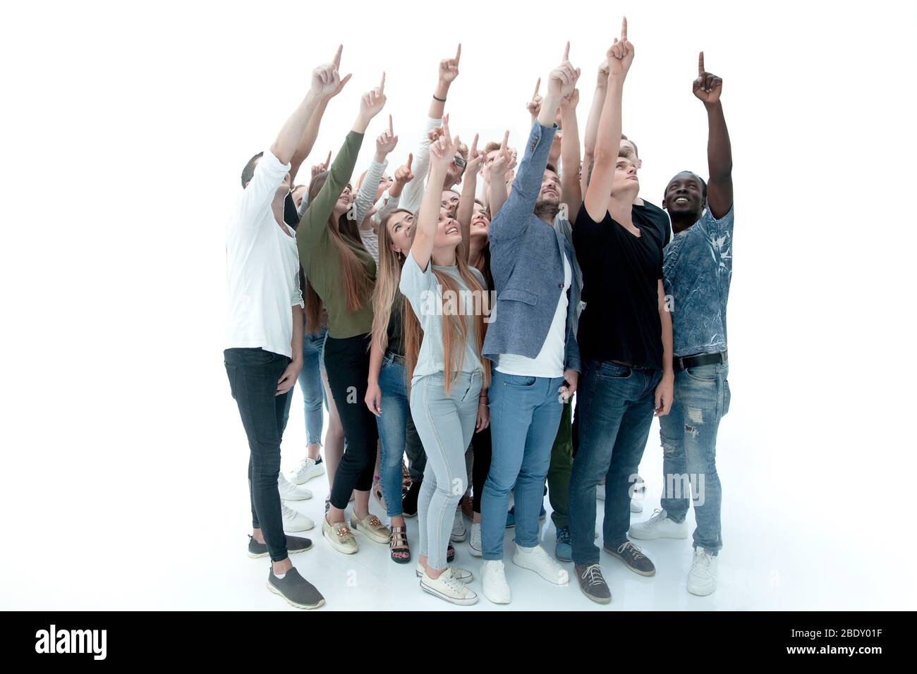 group of diverse young people pointing upwards Stock Photo - Alamy