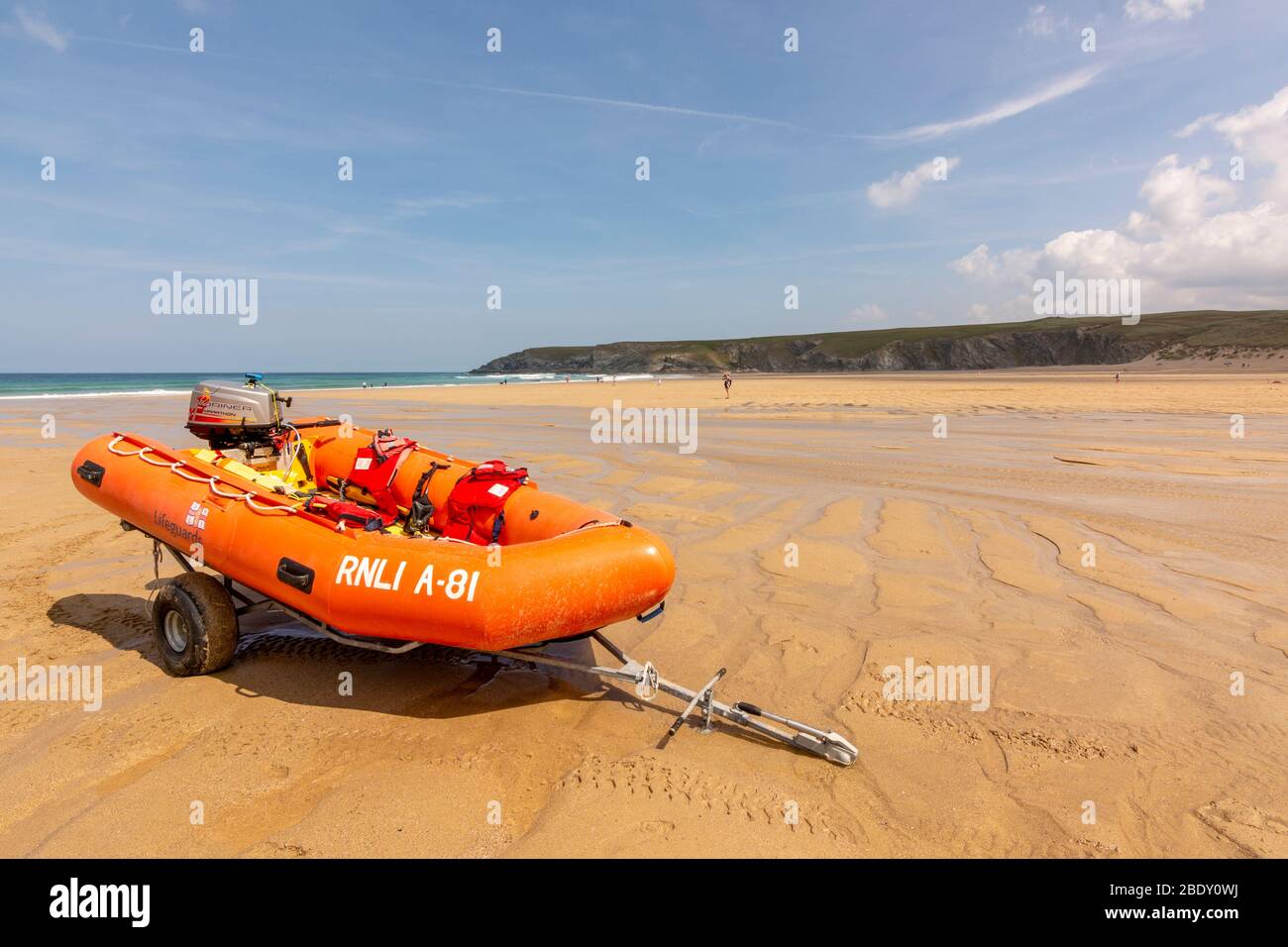 Family beach sand sea inflatable hi-res stock photography and images ...
