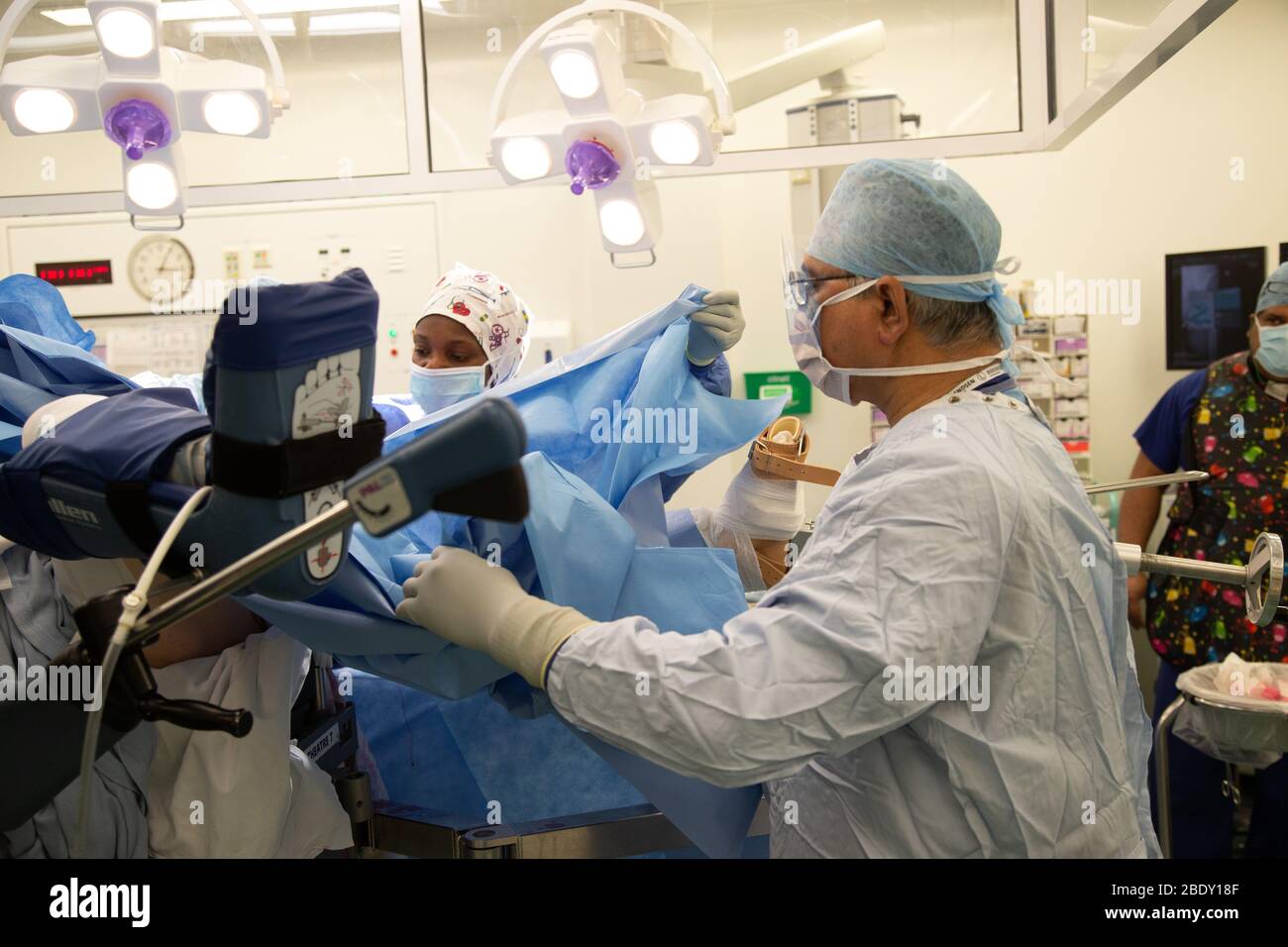NHS surgeons and nurses perform surgery in an NHS Hospital.The ...