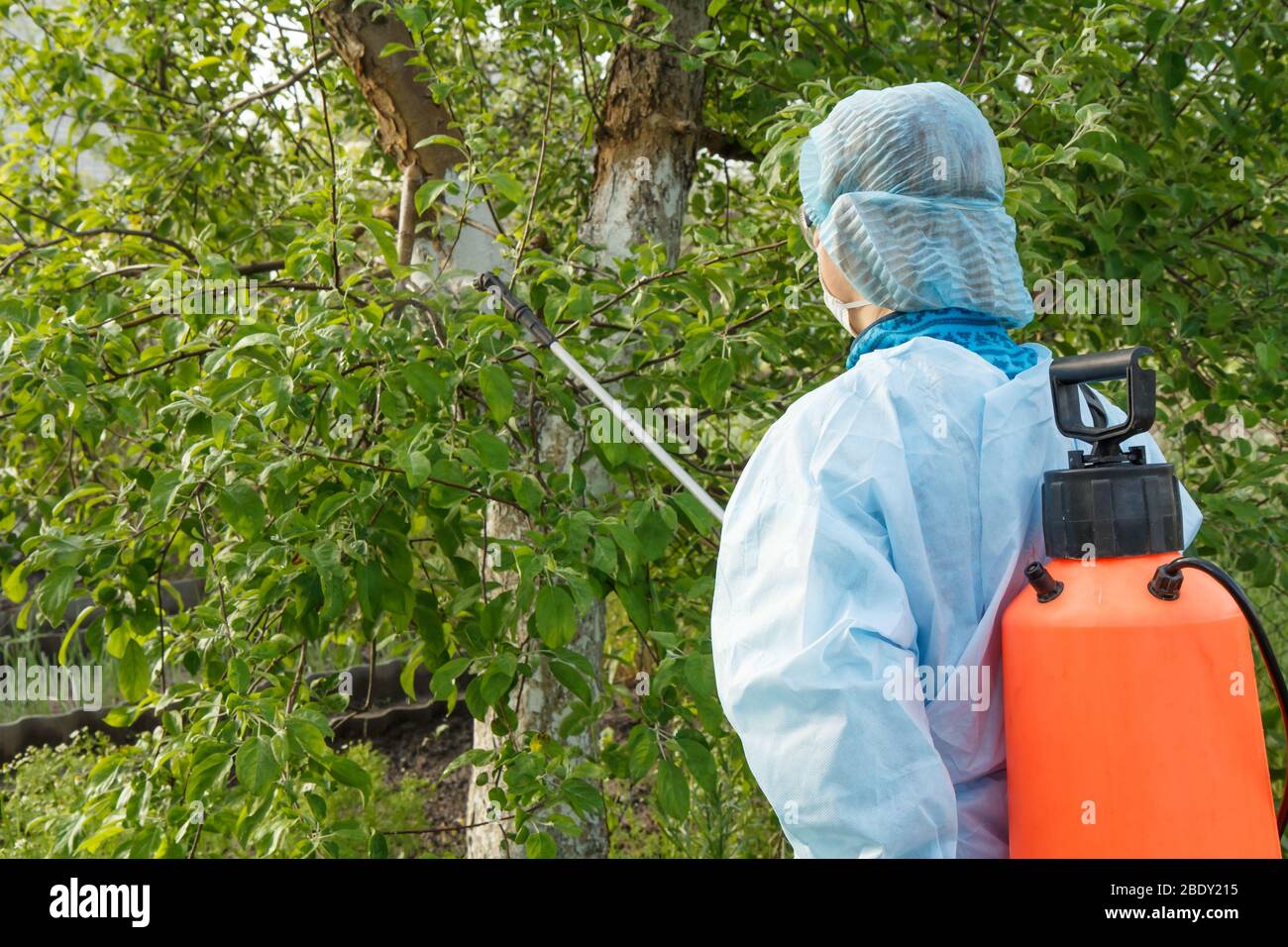 Spraying chemicals garden hi-res stock photography and images - Alamy