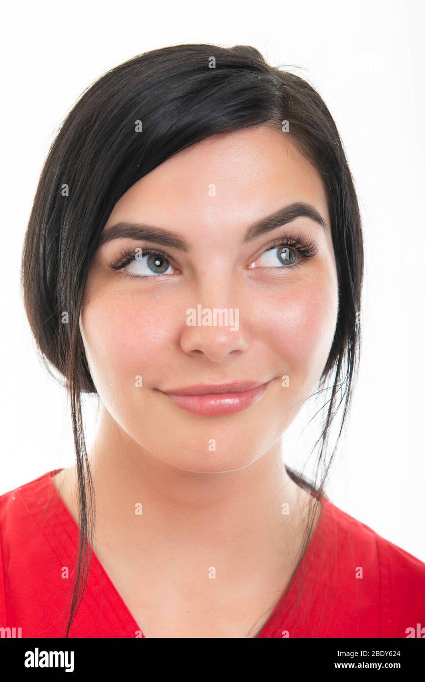 Portrait of young attractive female nurse offering hand shake isolated ...