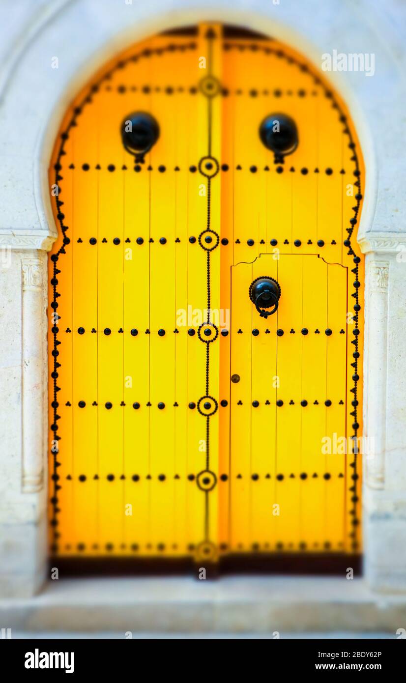 Spiked wooden door in the medina Stock Photo - Alamy