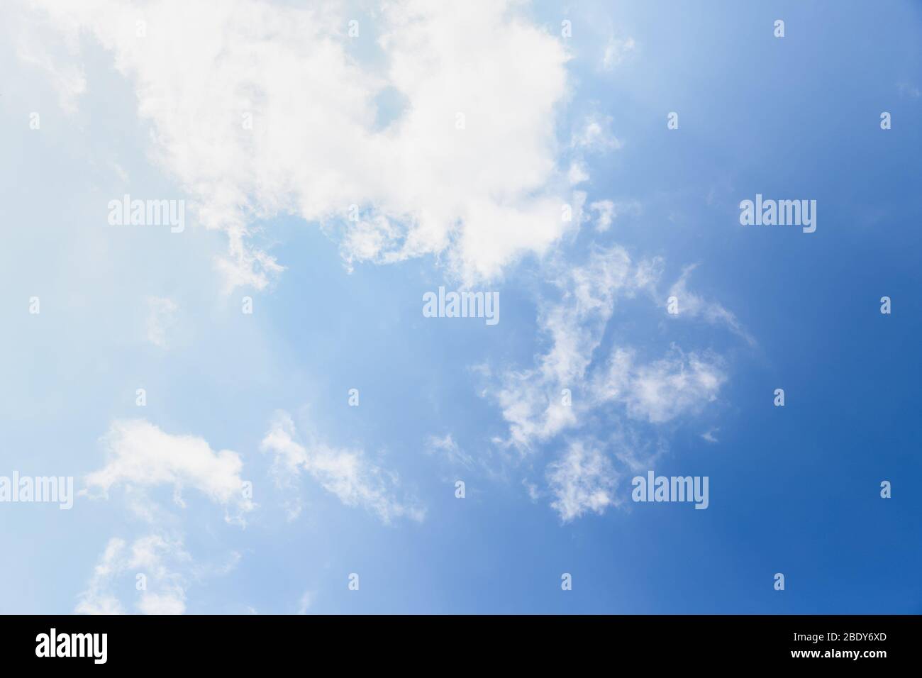 Light transparent white light clouds on a blue background Stock Photo ...