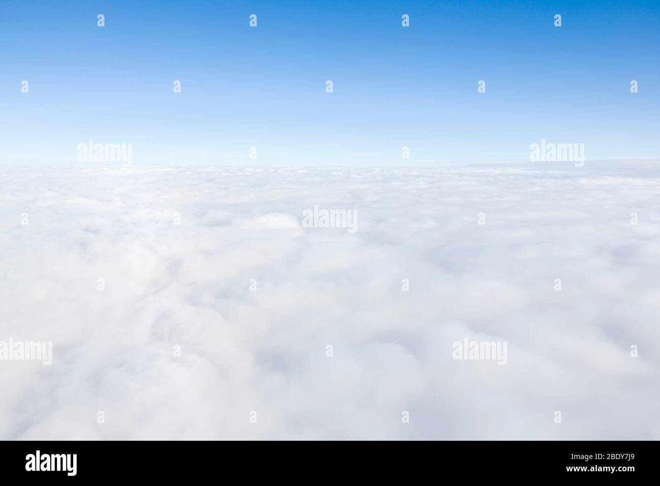 Aerial view flying above clouds in the atmosphere, depicts heaven ...