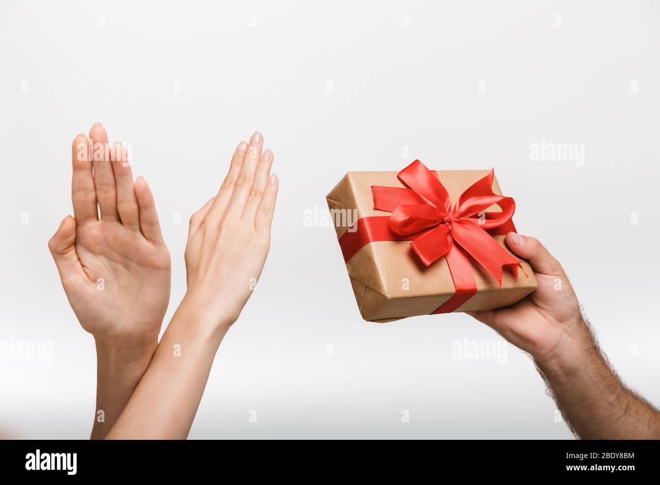 Closeup picture of woman's hands showing stop gesture while her man ...