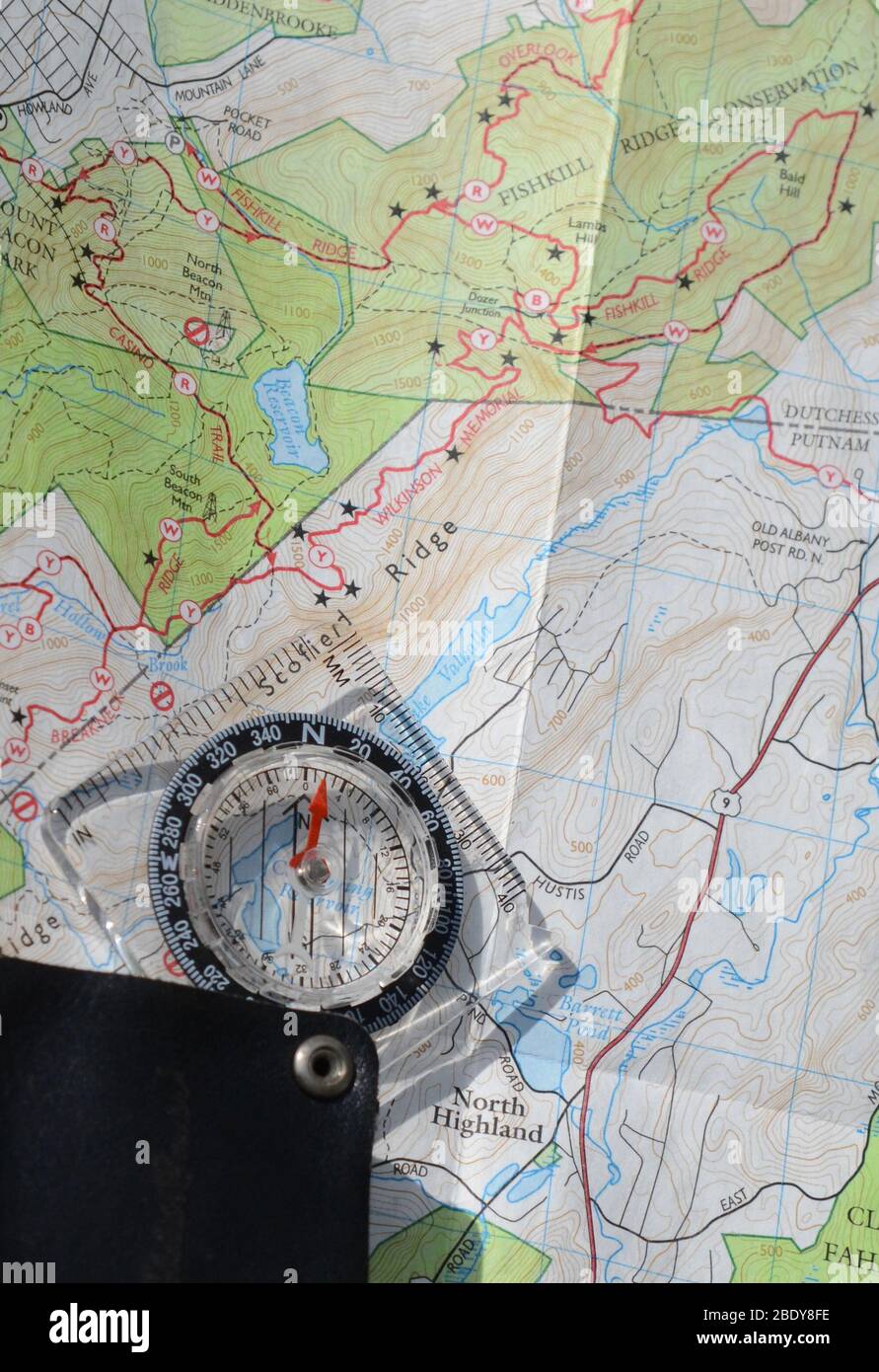 Compass and Map Stock Photo - Alamy