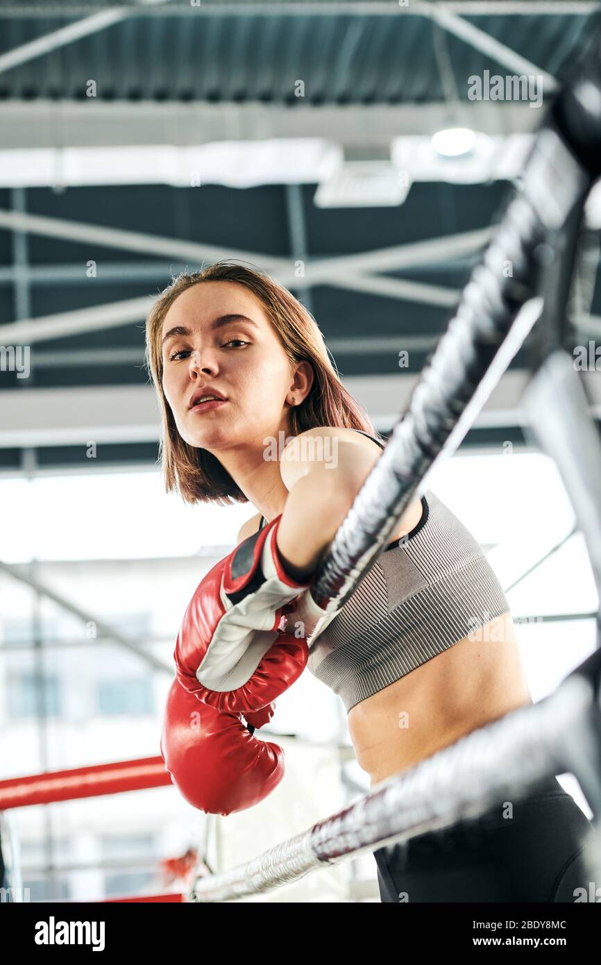 Woman standing in boxing ring hi-res stock photography and images - Alamy