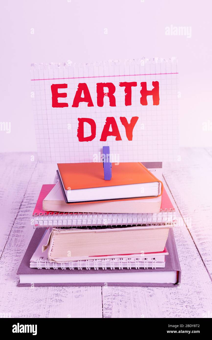 Writing note showing Earth Day. Business concept for Worldwide ...