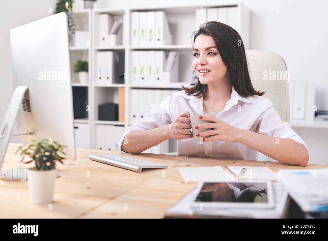 Talking through the computer hi-res stock photography and images - Alamy