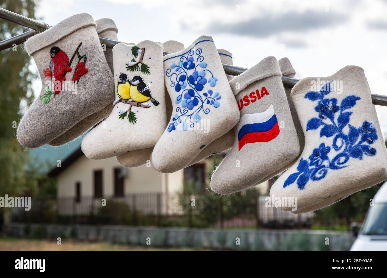 Russian traditional souvenirs. Winter felt boots with drawns. National ...