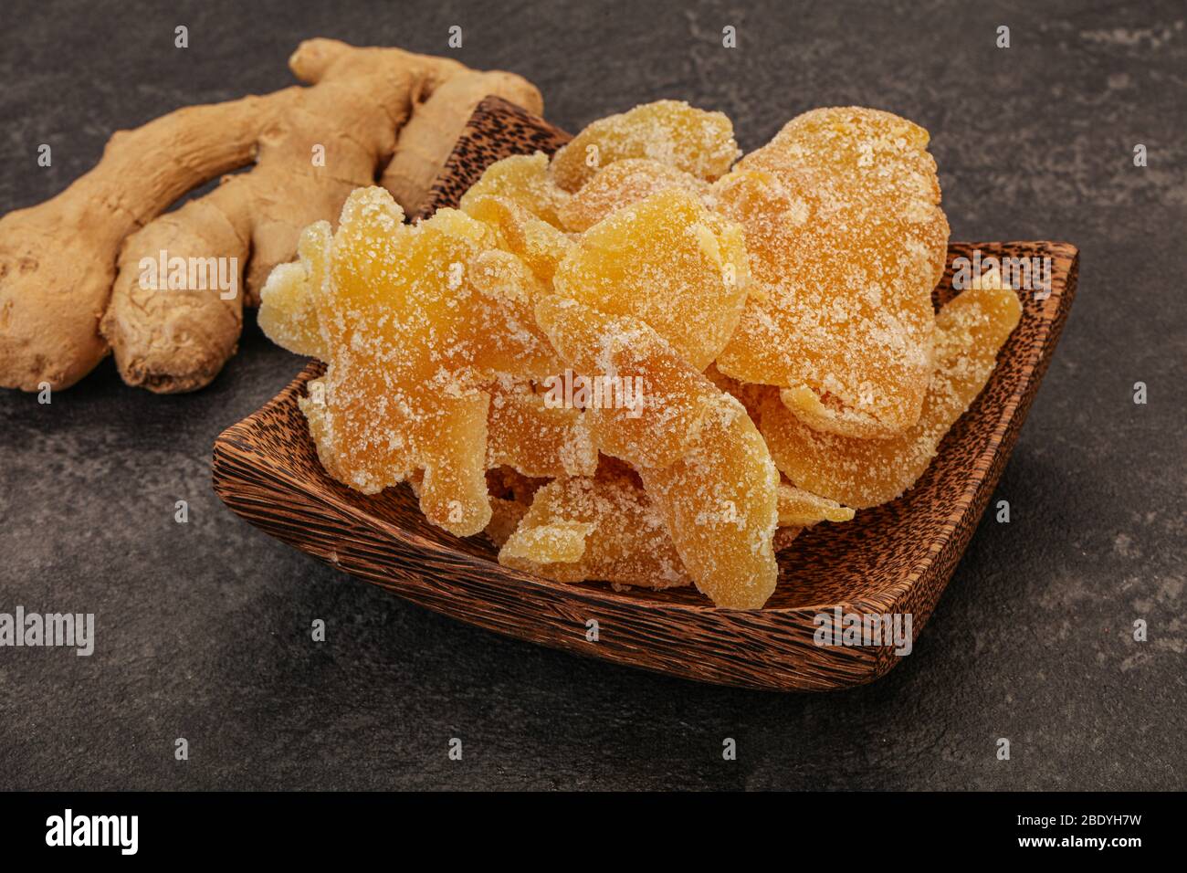 Dry sweet ginger snack in the bowl Stock Photo - Alamy