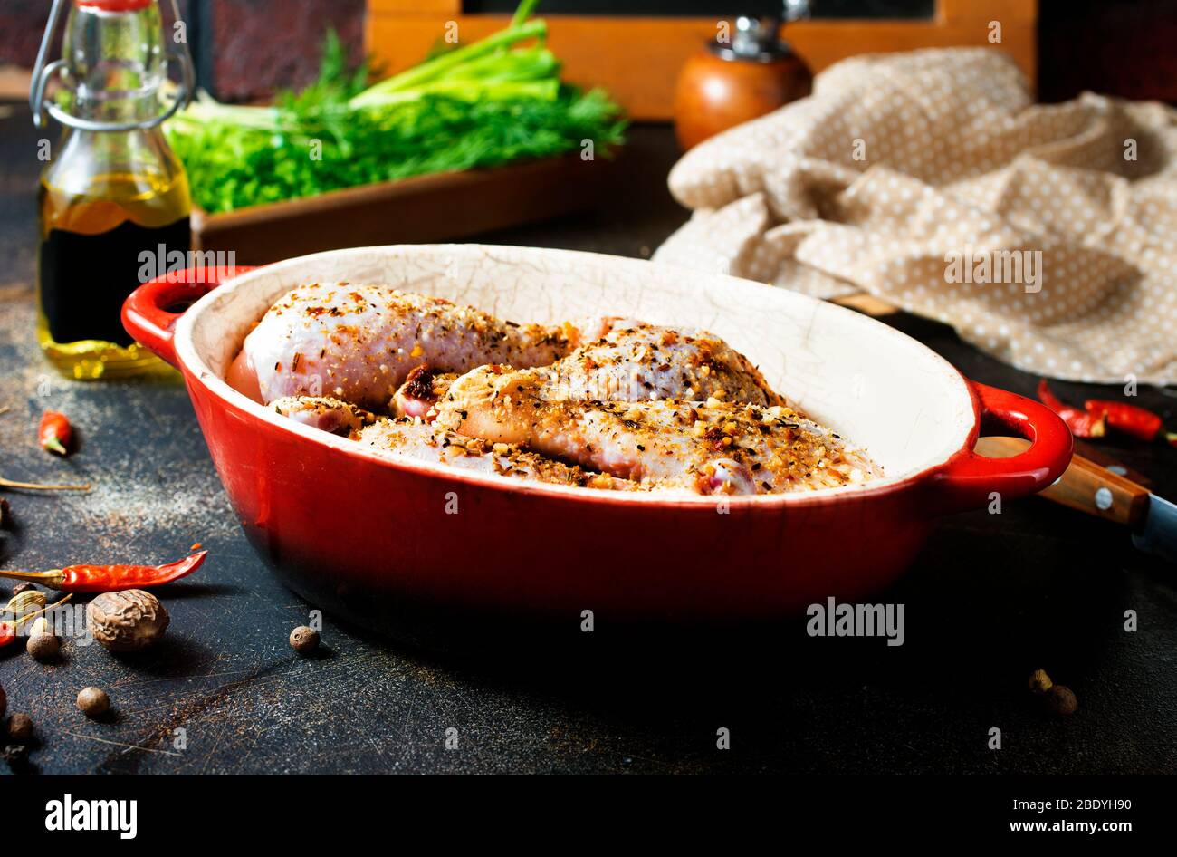 Raw seasoned chicken legs hi-res stock photography and images - Alamy