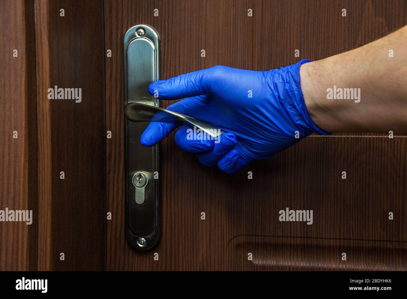 Hand door handle glove hi-res stock photography and images - Alamy