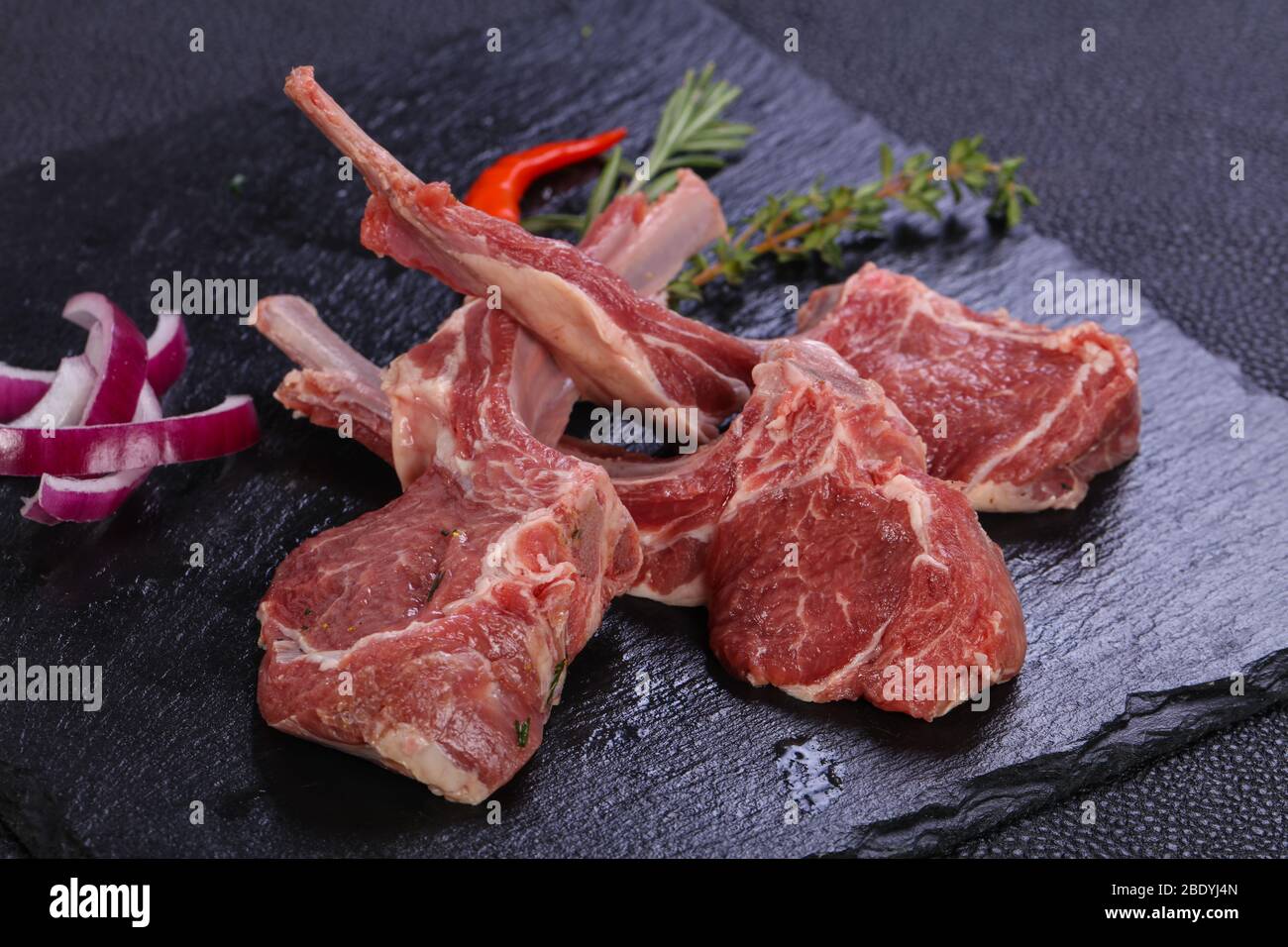 Raw rack of lamb ready for grill Stock Photo - Alamy