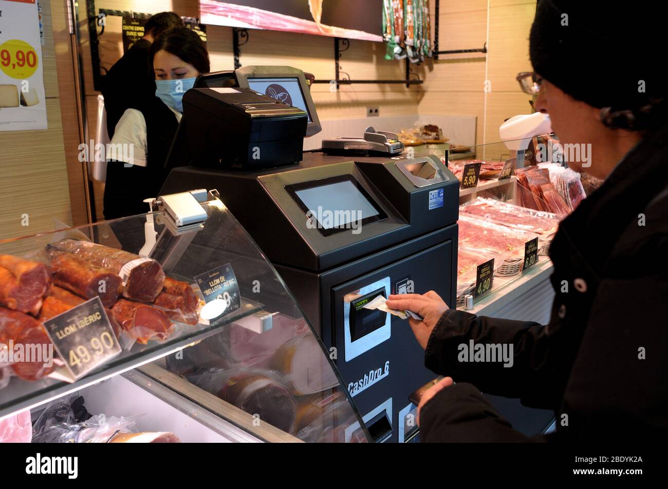 paying by machine Stock Photo - Alamy