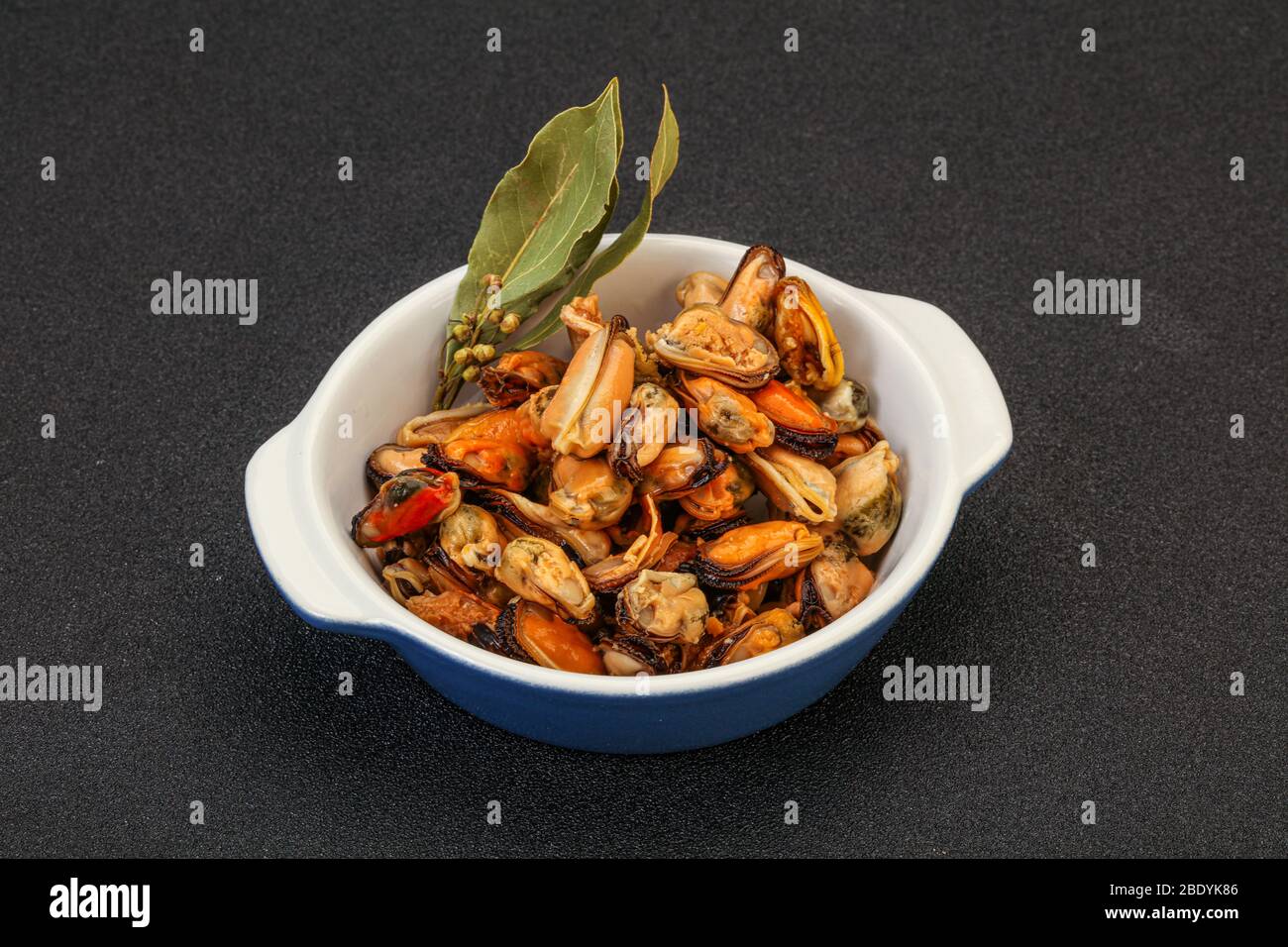 Pickled mussels with spices in the bowl Stock Photo - Alamy
