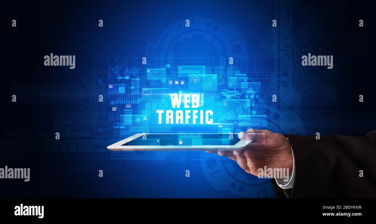 Young business person working on tablet and shows the digital sign: WEB ...