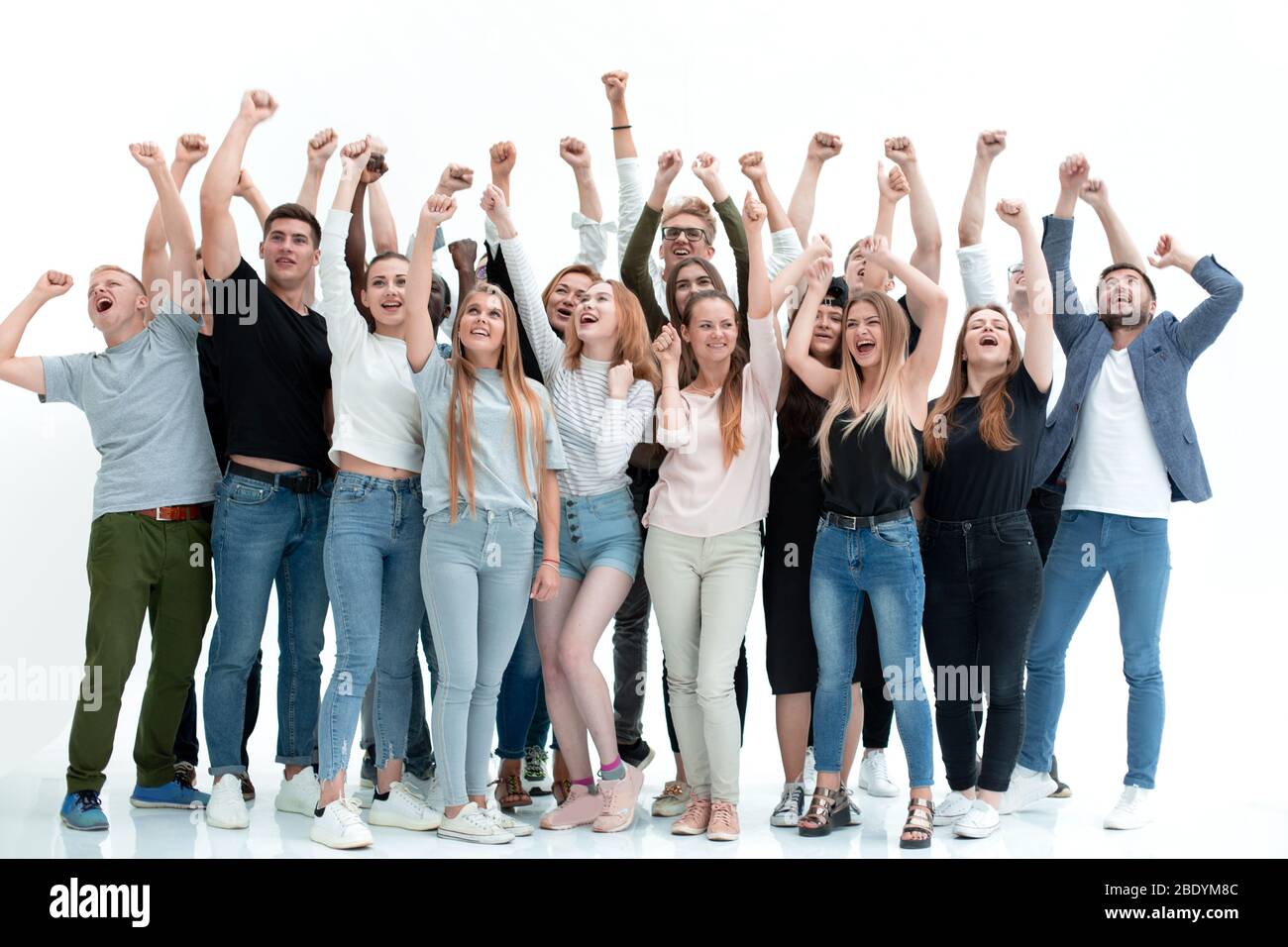 happy group of young people with hands up Stock Photo - Alamy