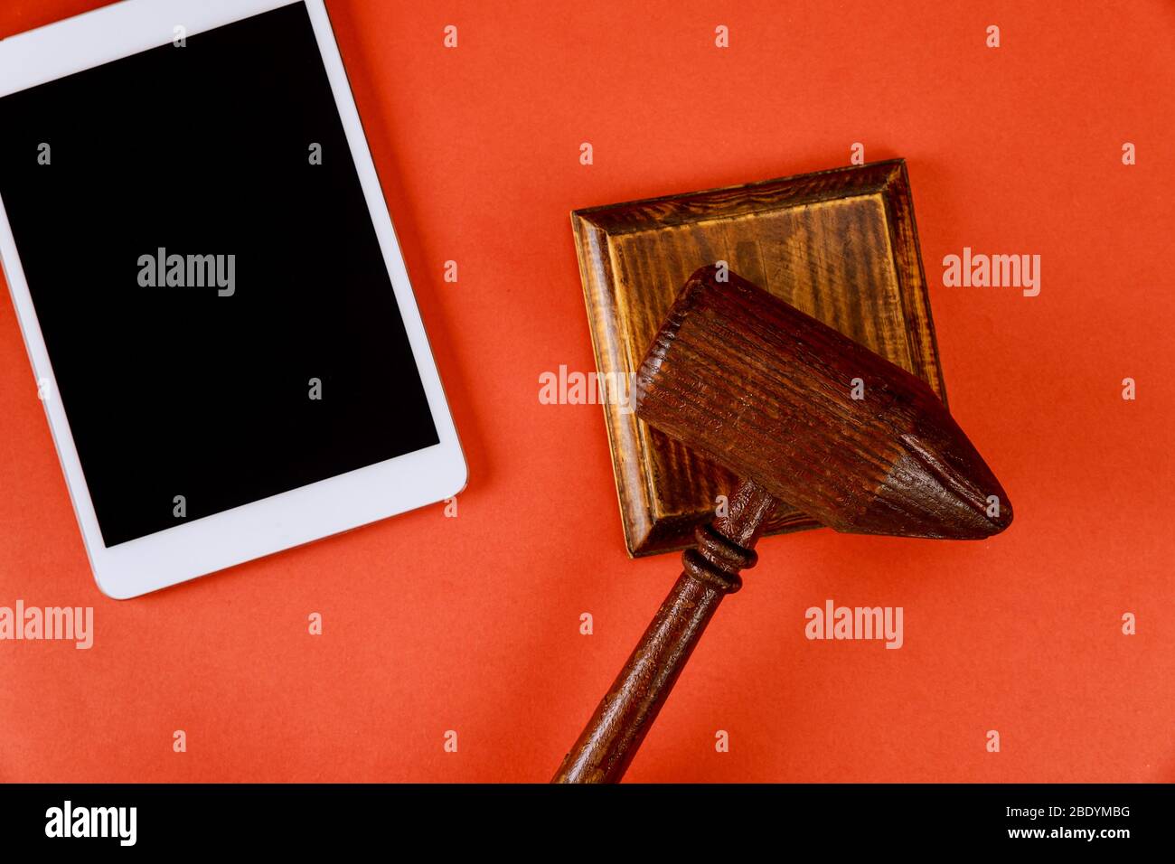 Business office desk with auction wooden gavel and working digital ...