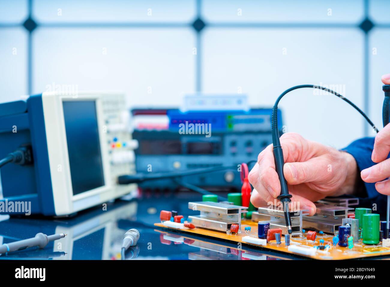 PCB witch microcontroller in electronics laboratory Stock Photo - Alamy