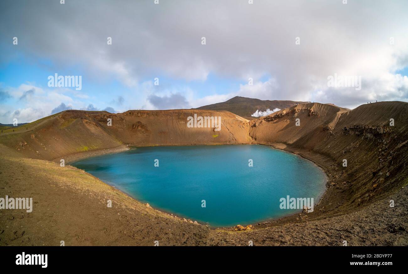 The mouth of a volcano crater filled with water in Iceland. Water Lake ...