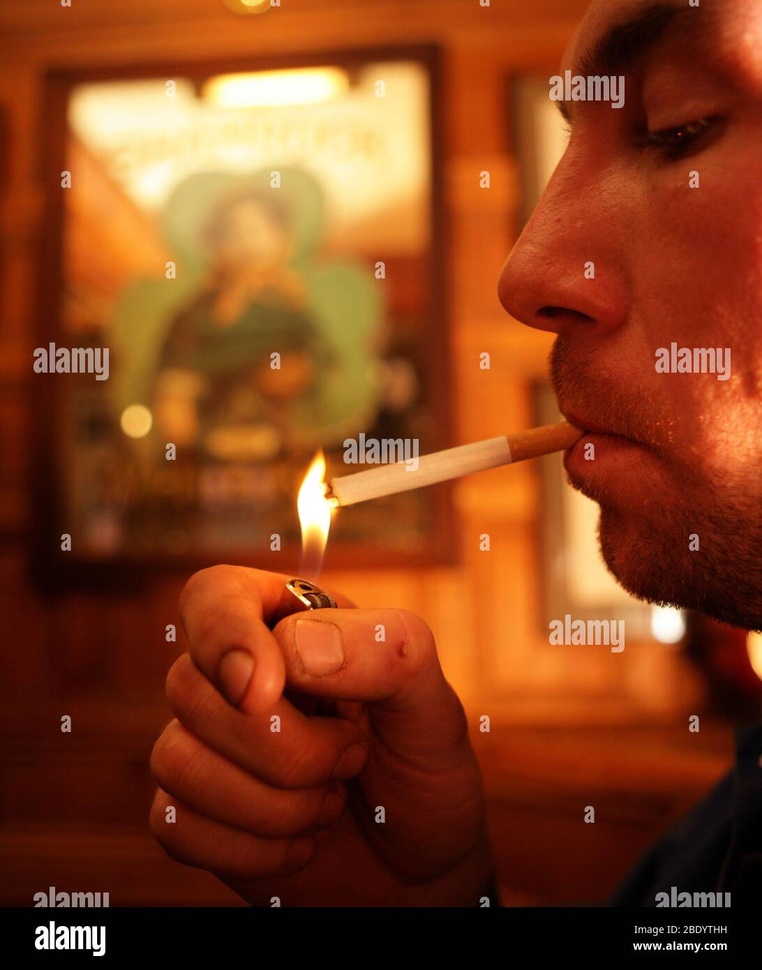 Kenny Lowe lights up in Belfast's Duke of York pub. Photo/Paul McErlane ...
