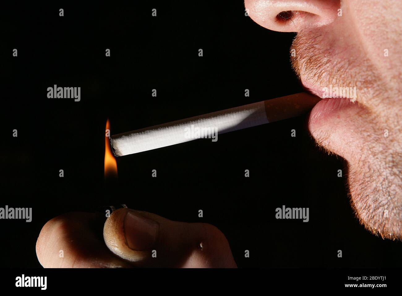 Kenny Lowe lights up in Belfast's Duke of York pub. Photo/Paul McErlane ...