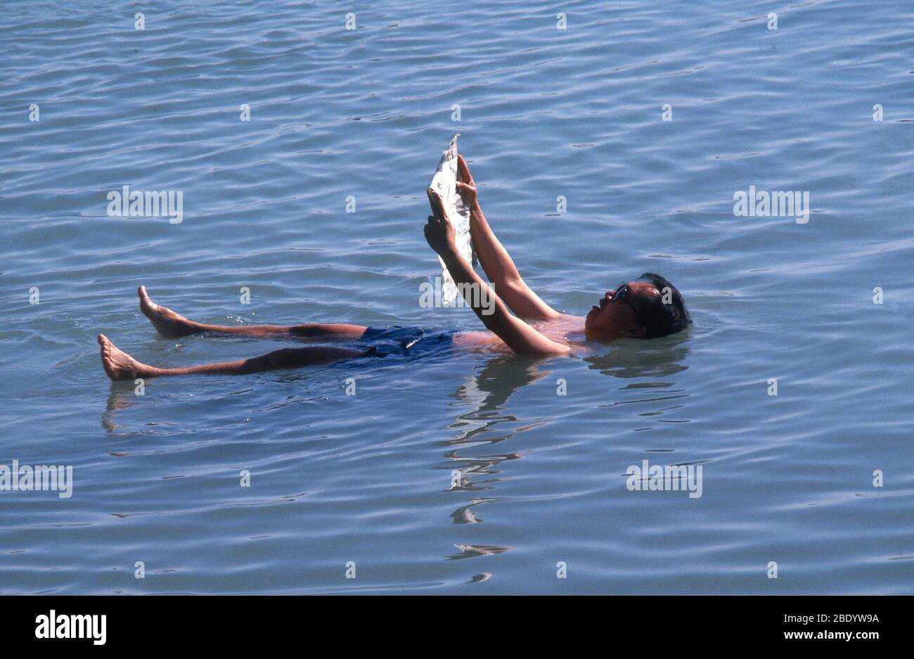 Dead sea floating reading hi-res stock photography and images - Alamy