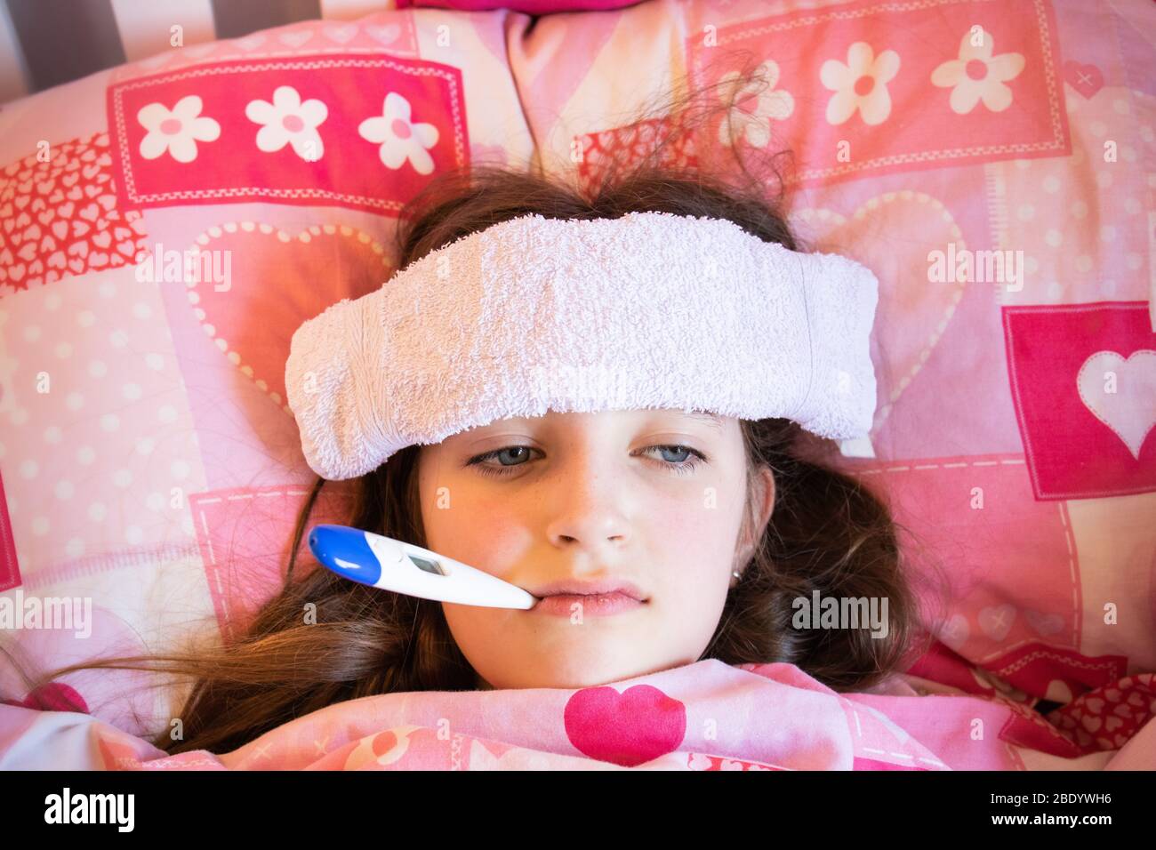 Sick girl in bed hi-res stock photography and images - Alamy