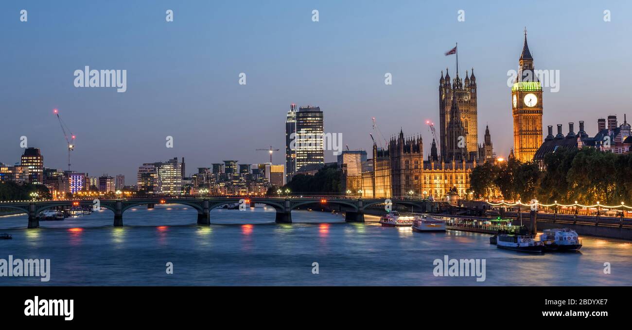 Westminster abbey and big ben in London skyline at night, London, UK ...