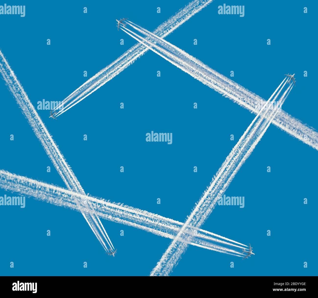 Five jet planes on blue sky background Stock Photo - Alamy